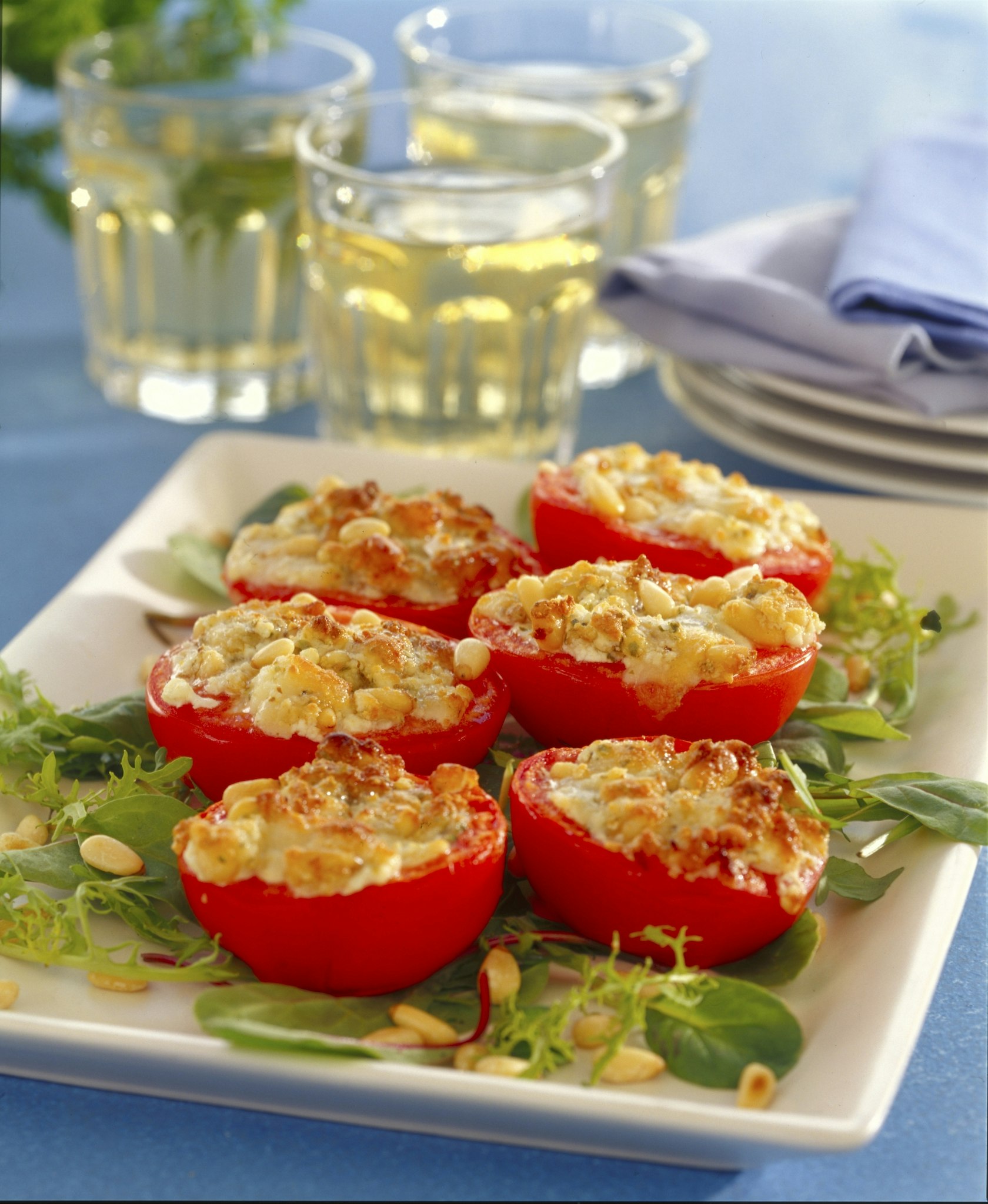 Gratinerade solmogna tomater med getost