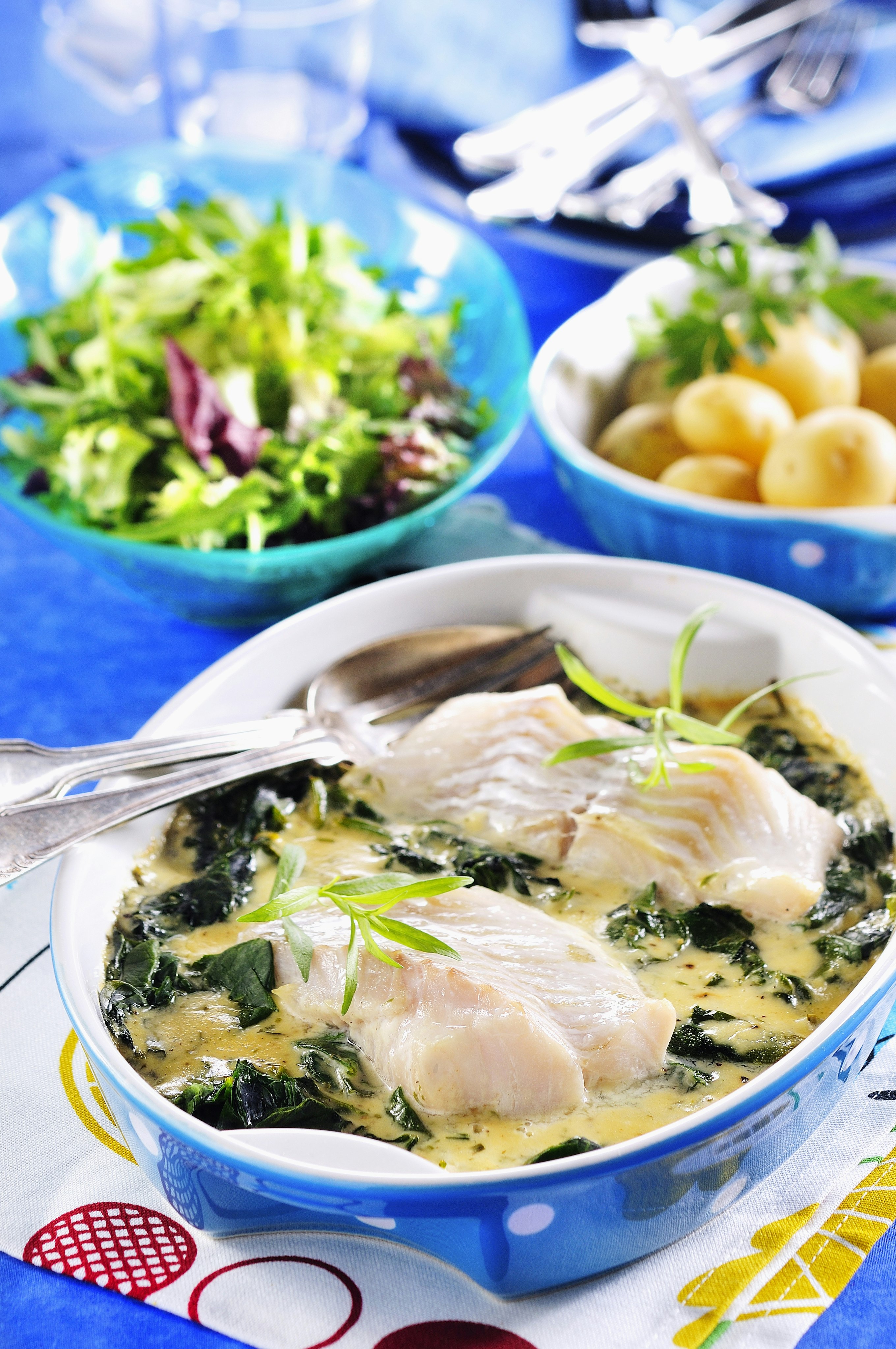 Torsk i panna med krämig vinsås