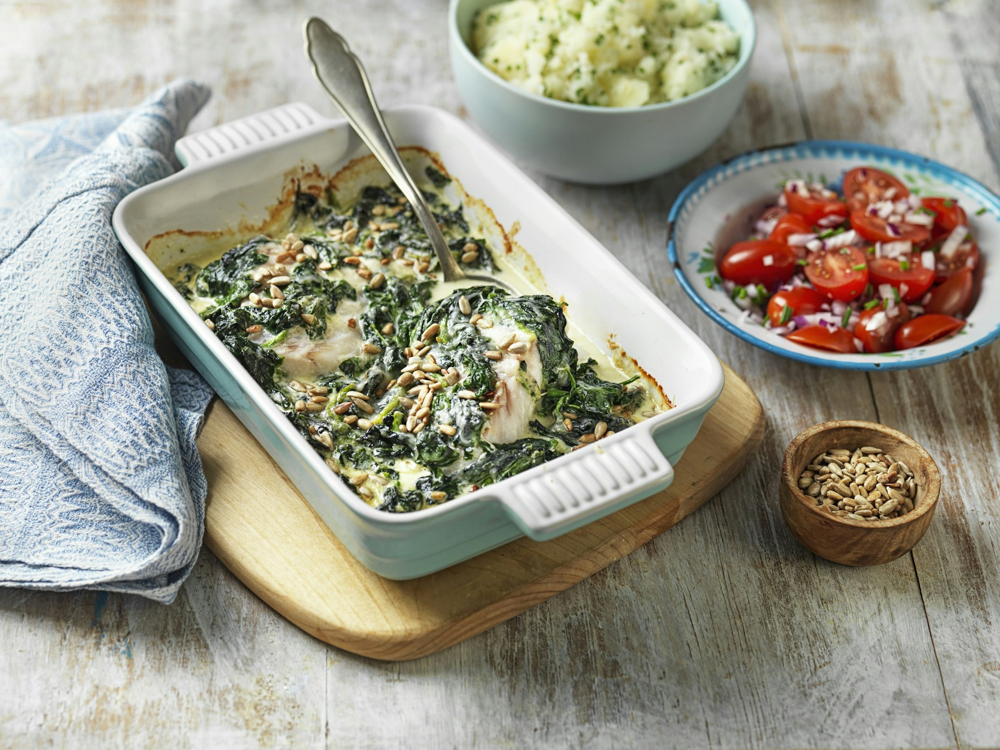 Ugnsbakad fisk med spenat och parmesan